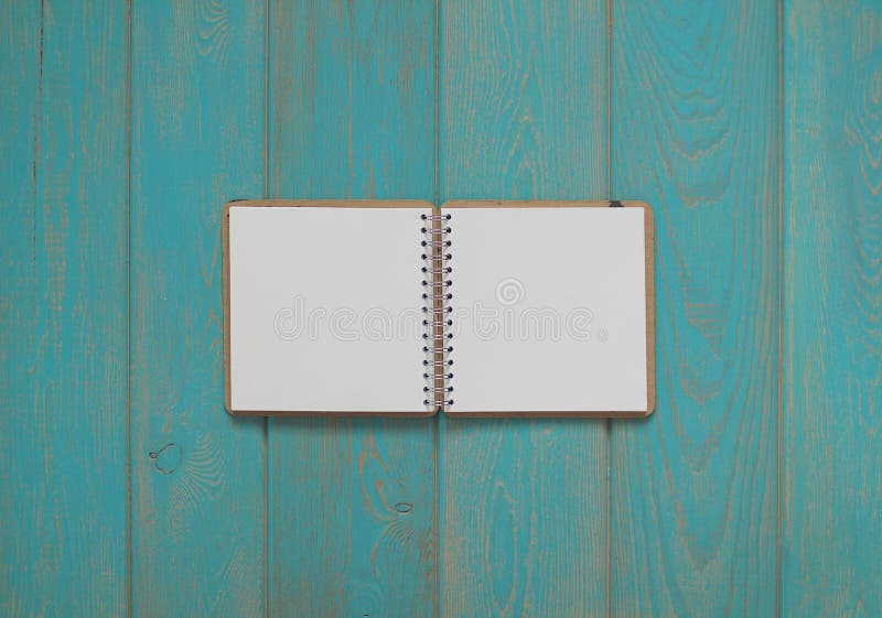 Note Book on Blue Wooden Desk. Stock Image - Image of copybook ...