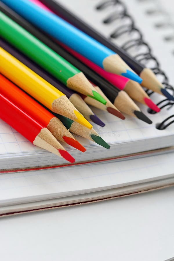 Note Book and Colored Pencils Stock Photo - Image of colored, closeup ...