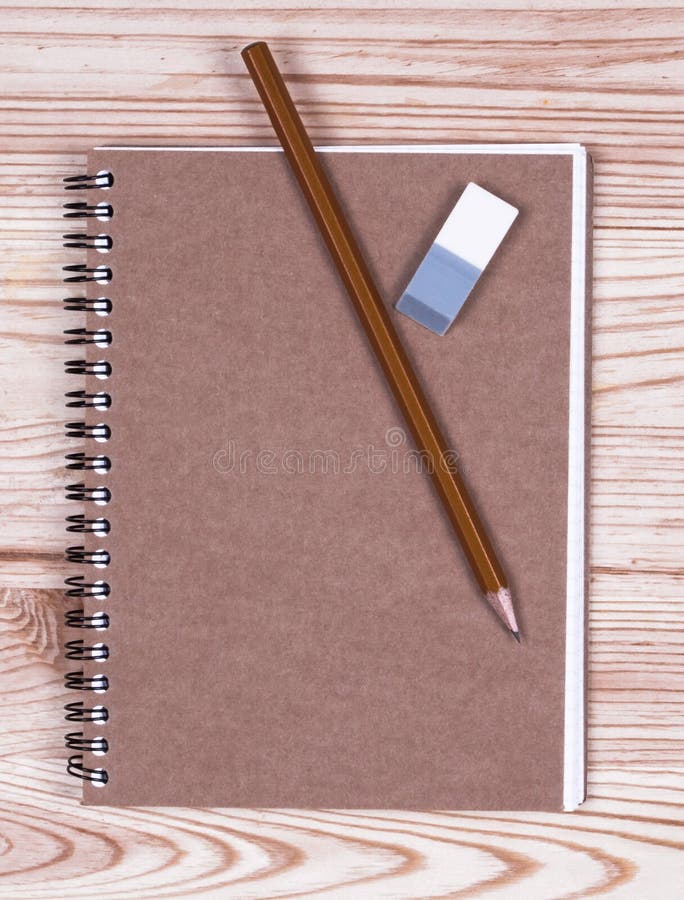 Note book on grunge wood stock photo. Image of brown - 65927002
