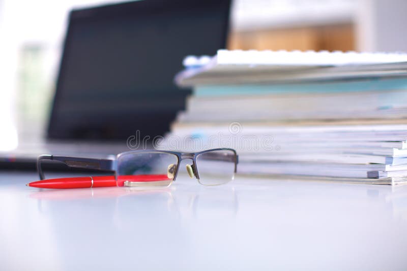 A Note Book, Laptop, Pen, Graph Paper Document on the Office Desk Table ...