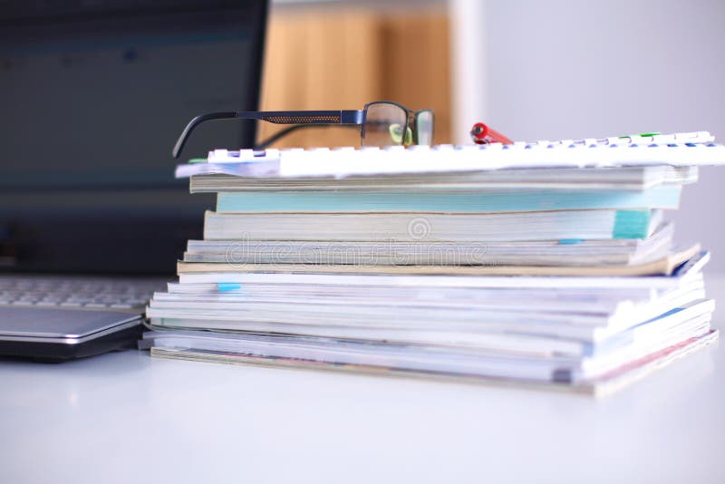 A Note Book, Laptop, Pen, Graph Paper Document on the Office Desk Table ...