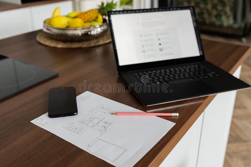 Note Book, Laptop and Phone on the Kitchen Table Stock Image - Image of ...