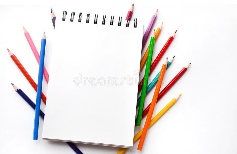 Note for Drawing and Colour Pencils on White Background. Stock Image ...
