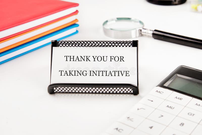 A Note Expressing Gratitude for Taking Initiative Rests on a Desk ...
