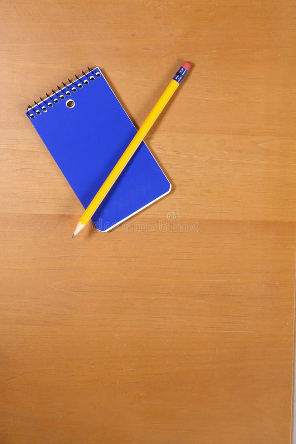 A Note Pad and Pencil on a Desk Stock Photo - Image of business ...