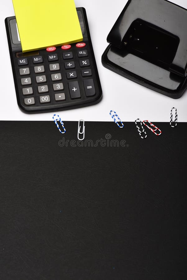 Note Paper, Hole Punch and Paper Clips on White Surface Stock Photo ...