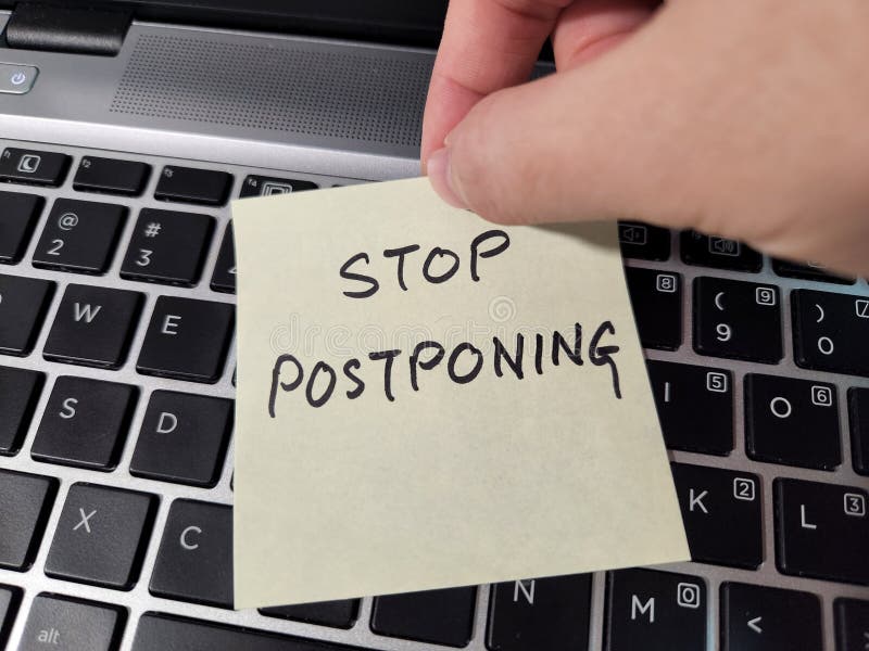A Note Showing the Phrase Stop Postponing Stock Photo - Image of ...