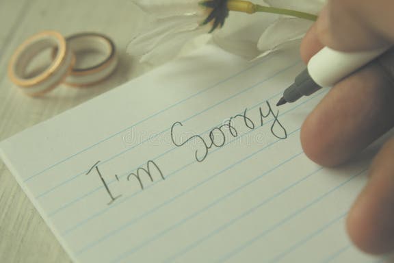 Note with the Sorry Word Next To a Wedding Ring. Stock Photo - Image of ...