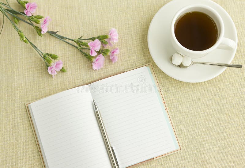 Note and tea on desk stock photo. Image of plate, still - 11322152