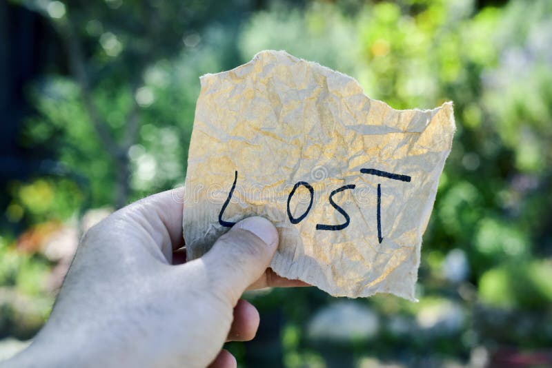 Note with the Text Lost in the Hand of a Man Stock Photo - Image of ...