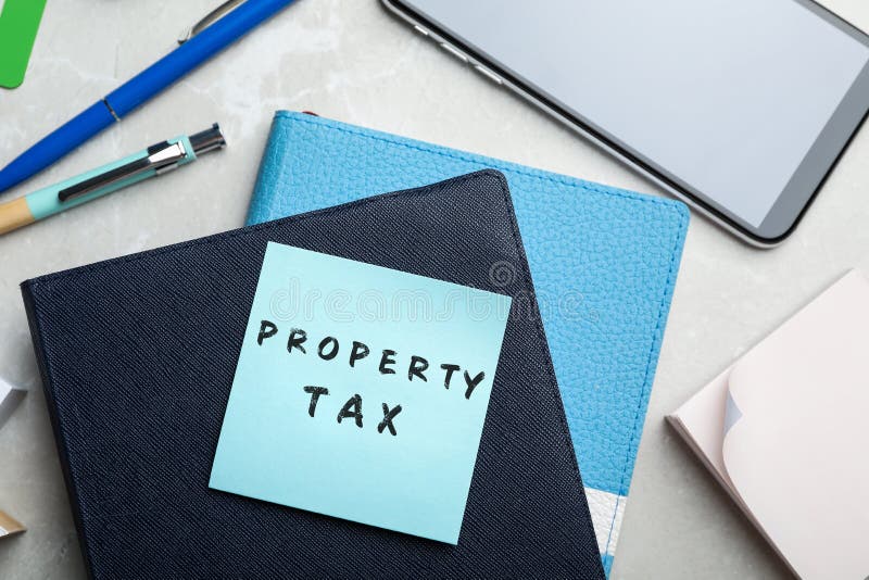 Note with Text Property Tax and Stationery on Table Stock Image - Image ...