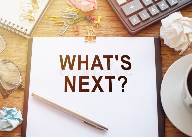 A Note with Whats Next Written on it Placed Next To a Cup of Coffee on ...