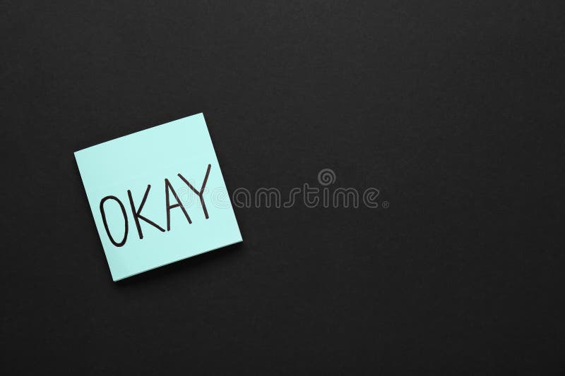 Note with Word Okay on Black Background, Top View. Space for Text Stock ...