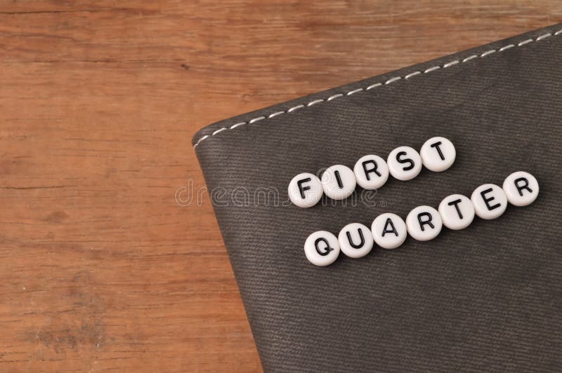 Notebook and Alphabet Beads with Text FIRST QUARTER Stock Image - Image ...