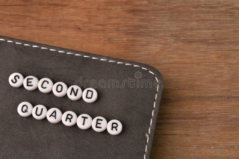 Notebook and Alphabet Beads with Text SECOND QUARTER Stock Image ...