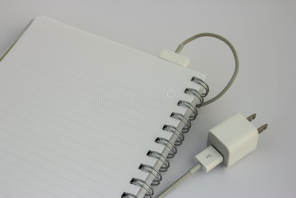 Notebook with Battery Charger Stock Photo - Image of ebook, book: 37890656