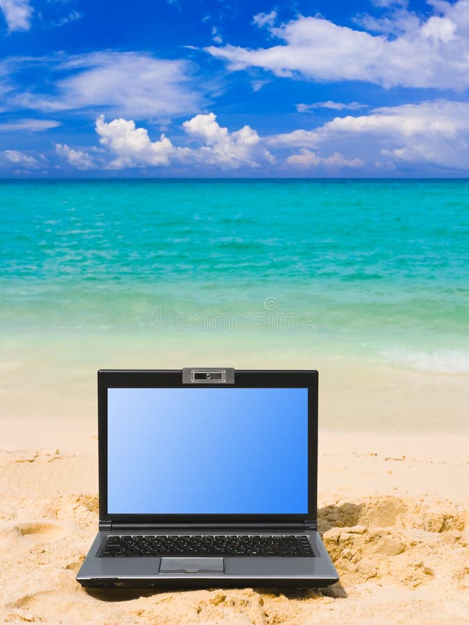 Laptop on the beach stock image. Image of blue, sand - 24389509