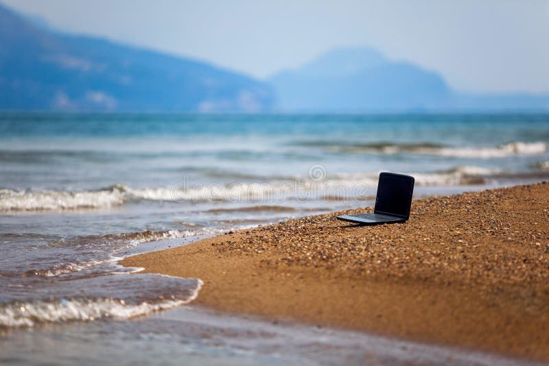 Notebook on a beach stock image. Image of monitor, notebook - 51463507