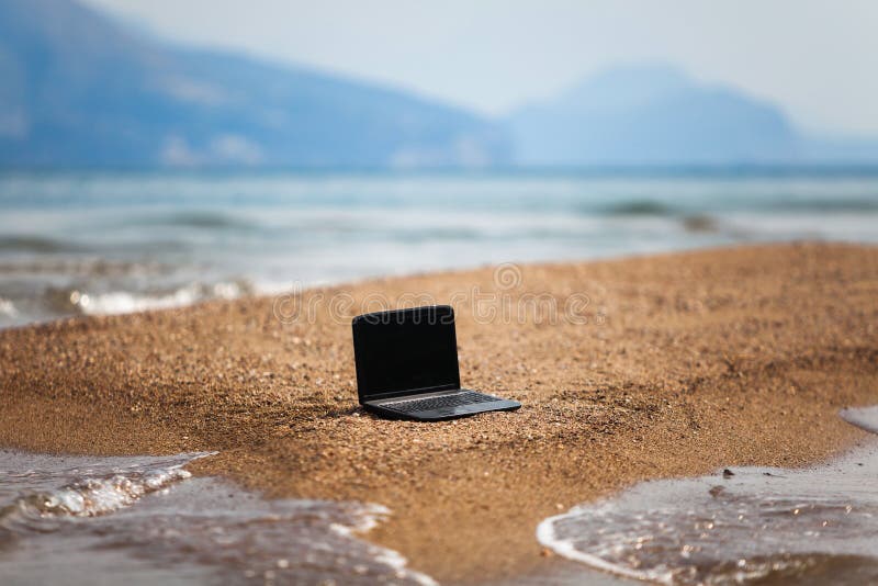 Notebook on a beach stock photo. Image of connection - 51745020
