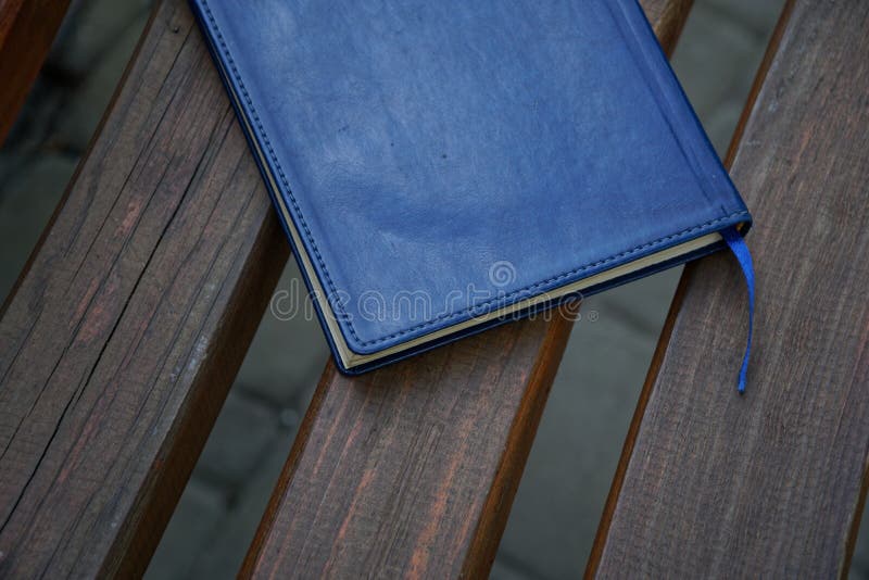 Notebook on Bench in Park, Business Concept Stock Photo - Image of ...