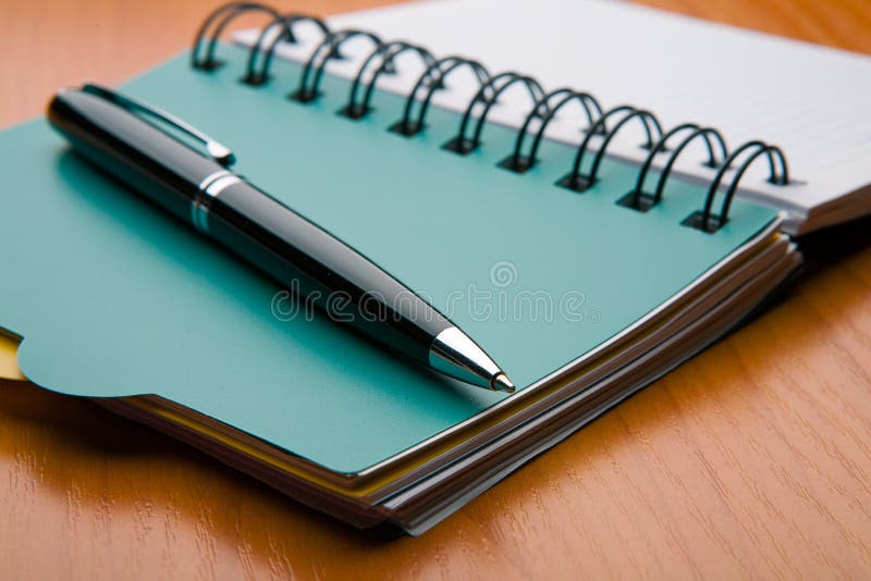 Notebook and black pen stock photo. Image of publish - 14468680
