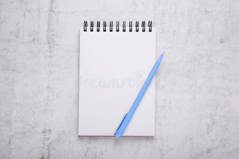 Notebook and Blue Marker on Light Grey Background, Top View Stock Photo ...