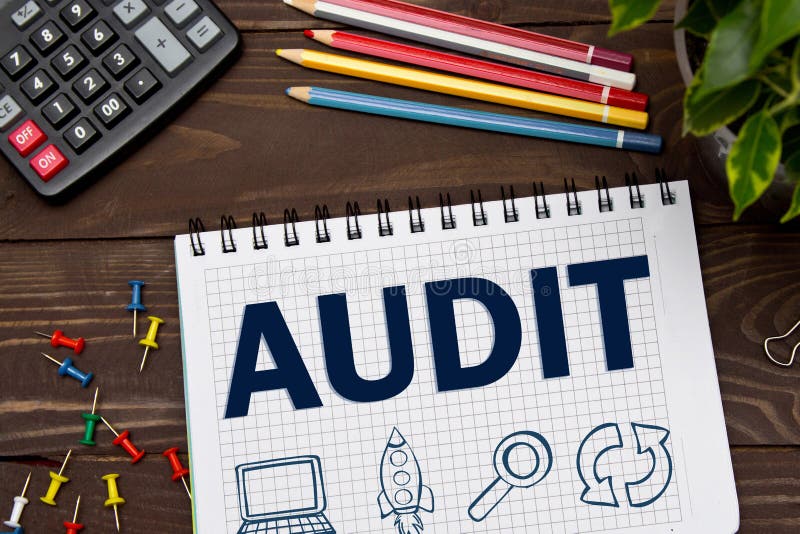 Notebook with a Business Notes AUDIT on the Office Table with Tools ...