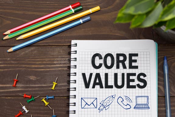 Notebook with a Business Notes CORE VALUES on the Office Table with ...