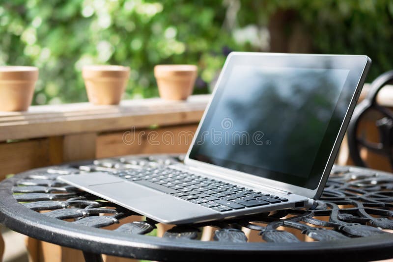 Notebook / Business Tablet with Keyboard Standing on Metal Table ...