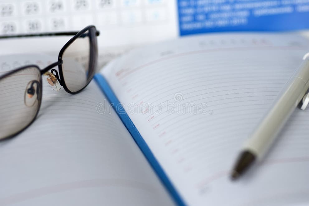 Notebook with a Calendar for Notes on the Desktop Stock Photo - Image ...
