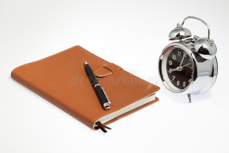 Notebook with clock stock photo. Image of paper, books - 44412104