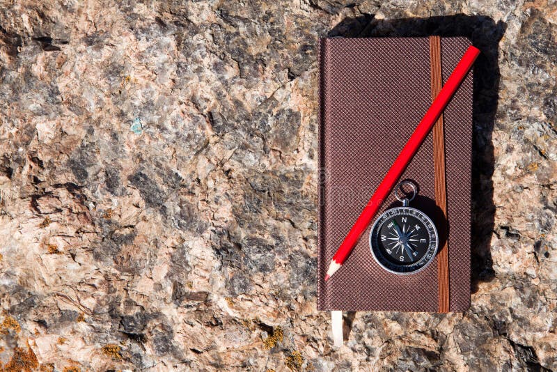 Notebook, Compass, Pencil on Stone Background Stock Image - Image of ...