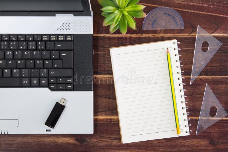 Notebook Computer on the Desk.USB Flash Drive Stick,paper Stock Photo ...