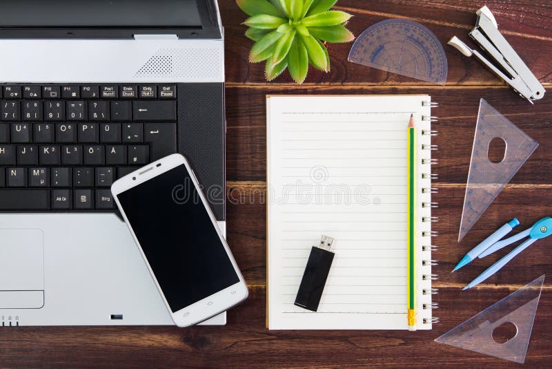 Notebook Computer on the Desk.USB Flash Drive Stick,paper,coffee Cup ...