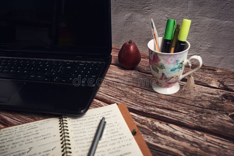 Notebook Computer Markers and Red Apple on the Wooden Table Stock Image ...