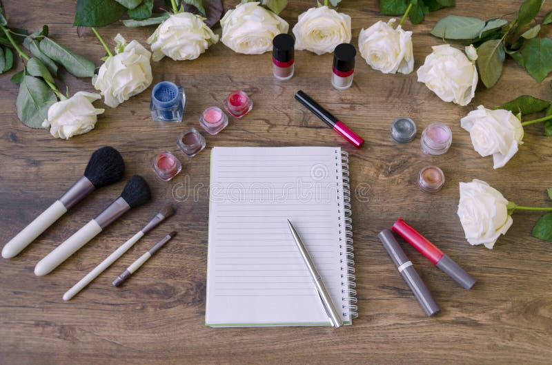 Notebook and Cosmetics, Handbag and Cosmetic Brushes Stock Photo ...