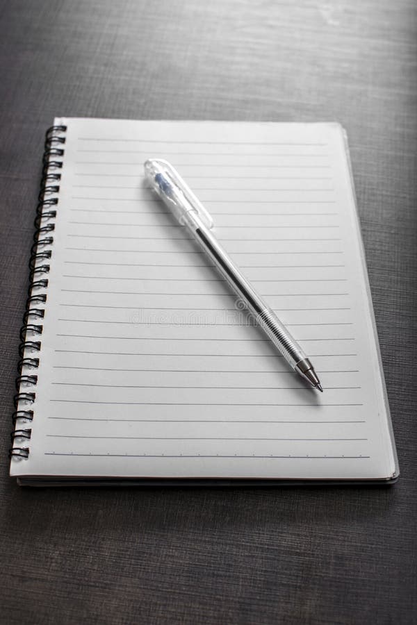 Notebook on desk stock photo. Image of lined, table, document - 67757898