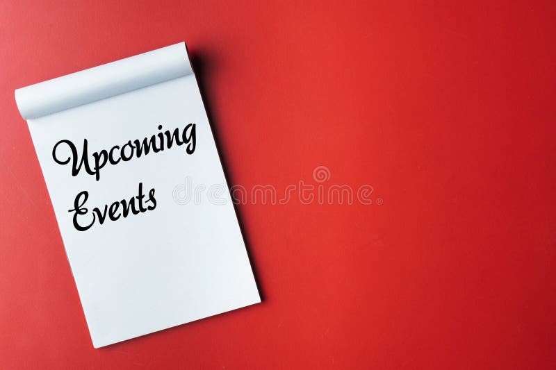 Notebook Displaying Upcoming Events Text on a Bold Red Surface Stock ...