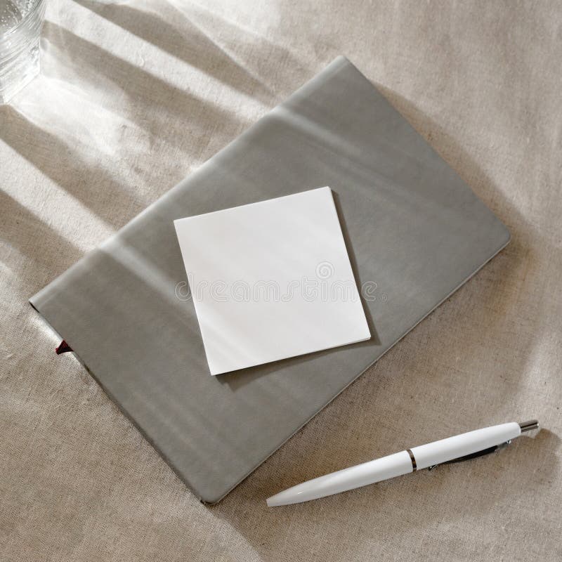 Notebook and Empty Paper Card on Table with Sunlight Shadows, Minimal ...