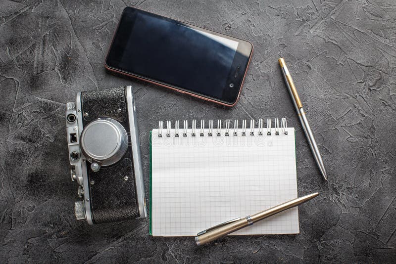 Notebook with film camera. stock image. Image of notebook - 83864339