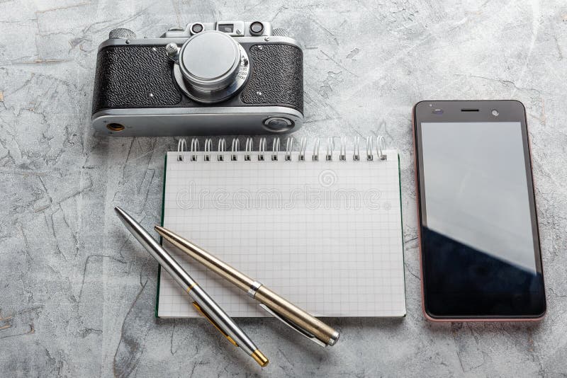 Notebook with film camera. stock image. Image of paper - 83865027