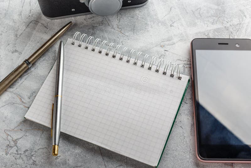 Notebook with film camera. stock photo. Image of paper - 83865050