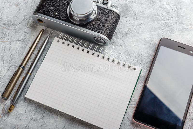 Notebook with film camera. stock photo. Image of design - 83870068