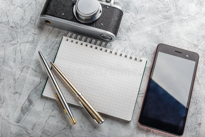 Notebook with film camera. stock image. Image of copy - 83869269