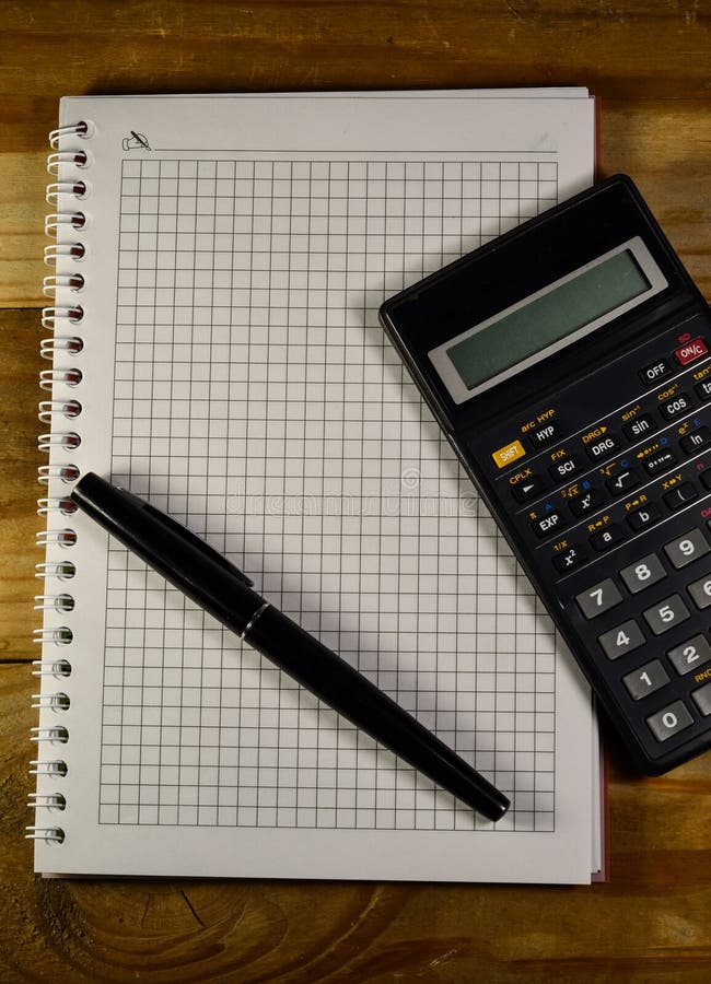 Notebook with Fountain Pen and Calculator on a Wooden Table Stock Image ...