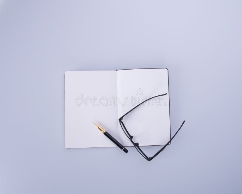 Notebook with Glasses and Pen on the Blackground. Stock Image - Image ...