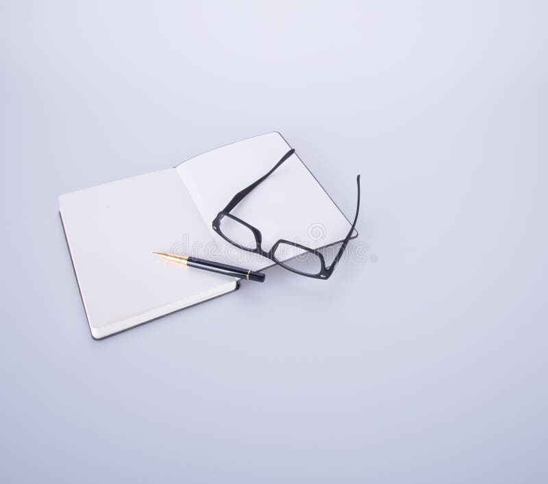 Notebook with Glasses and Pen on the Blackground. Stock Image - Image ...