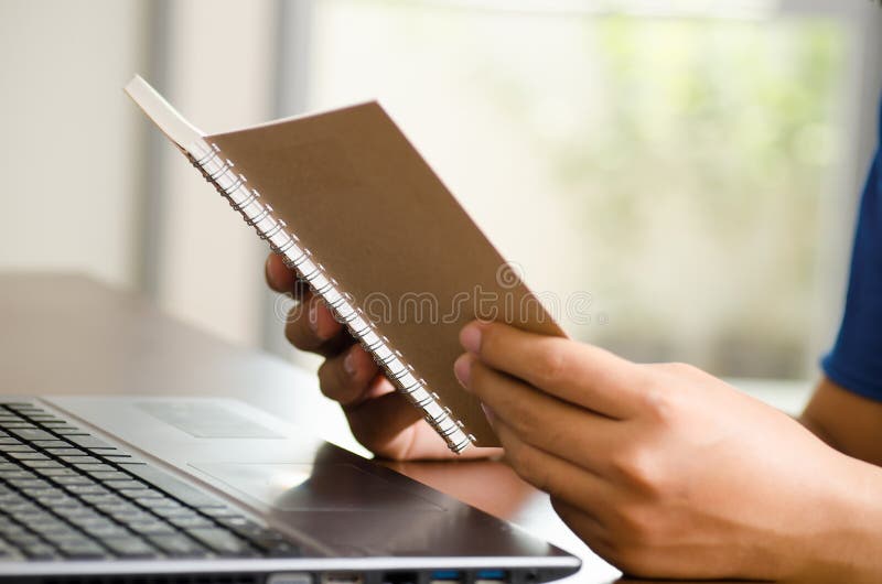 Notebook in hand stock image. Image of internet, hand - 94428811