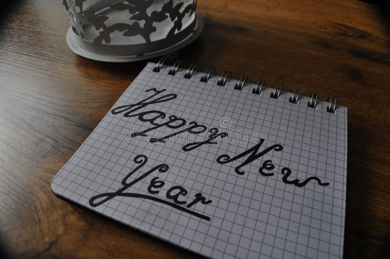 Notebook with Happy New Year Write on the Table Stock Image - Image of ...