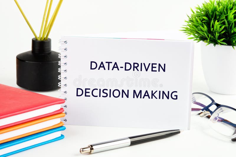 Notebook Highlighting Data-driven Decision Making on a Desk with Office ...